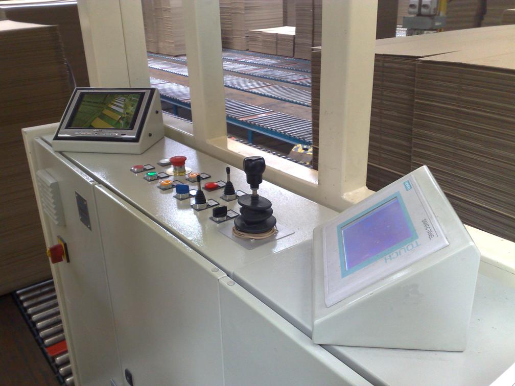 Automatic transfer cars for the Corrugated Board and Print Industries.